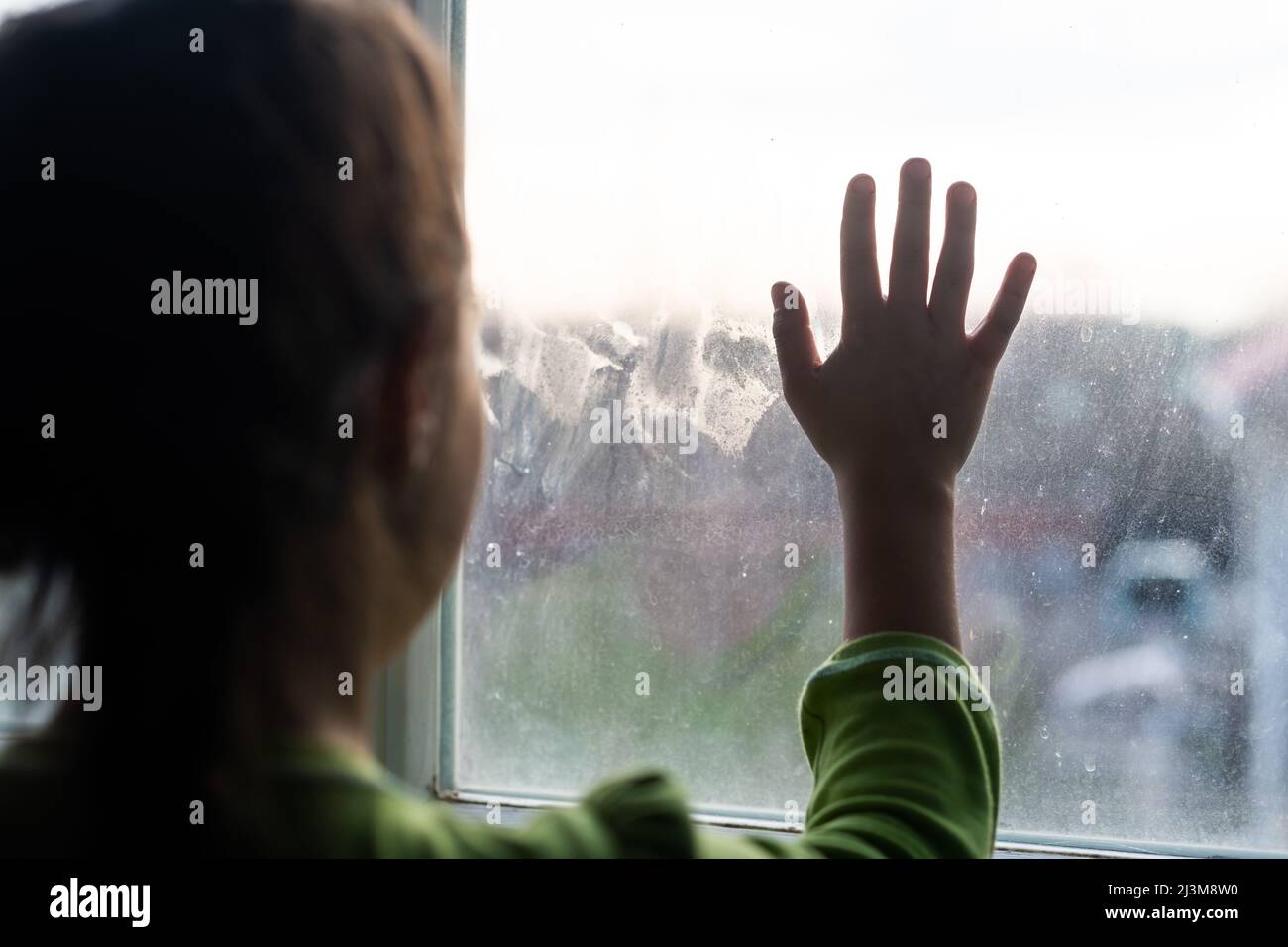 Child abuse sad face window hi-res stock photography and images - Alamy