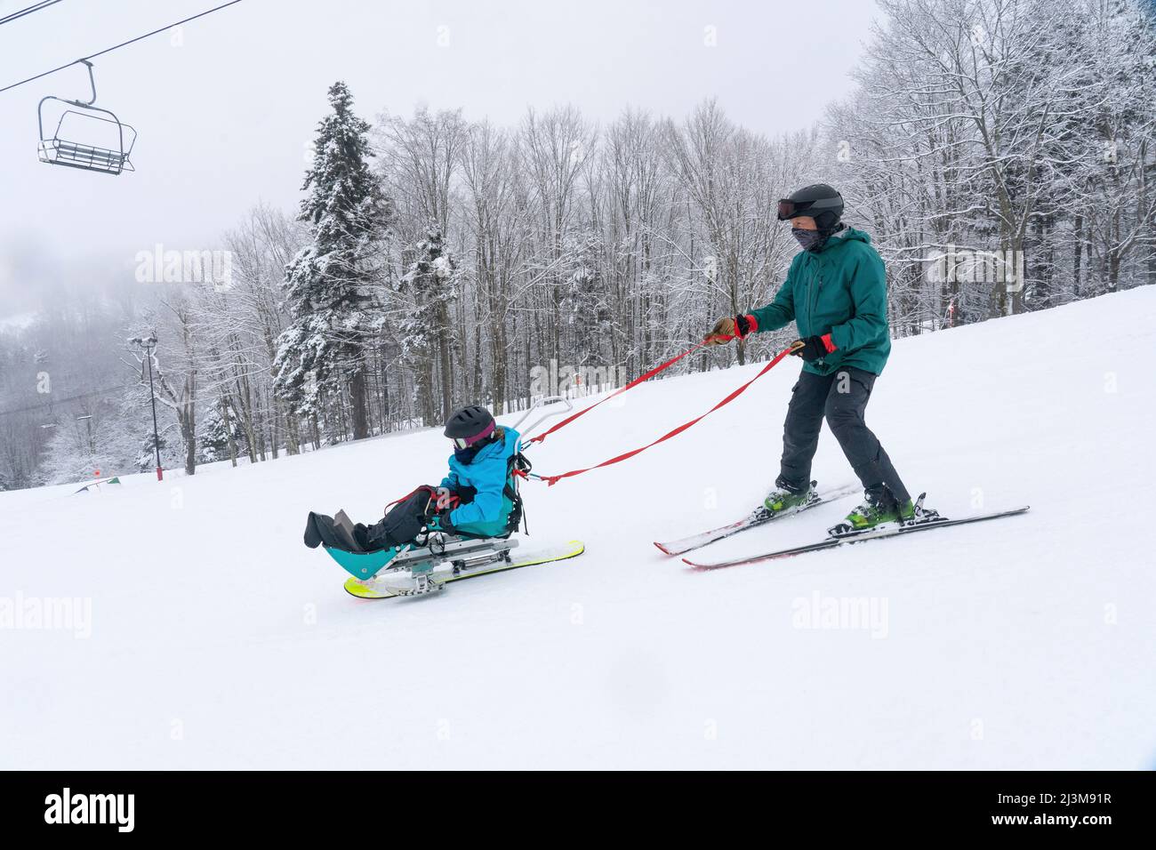Adaptive skiing for a girl with Ullrich Congenital Muscular Dystrophy ...