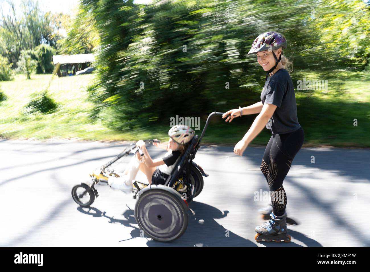 Girl with Ullrich Congenital Muscular Dystrophy riding her recumbent ...
