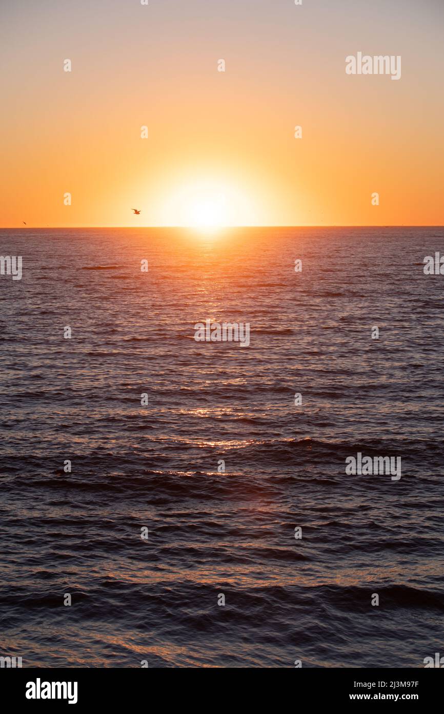 Sunrise in the sea with soft wave and cloudy. Seascape on sunrise over ...