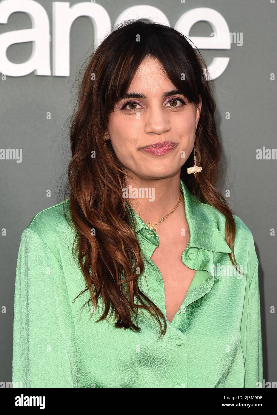 Natalie Morales walking on the red carpet at Apple Original Series ...