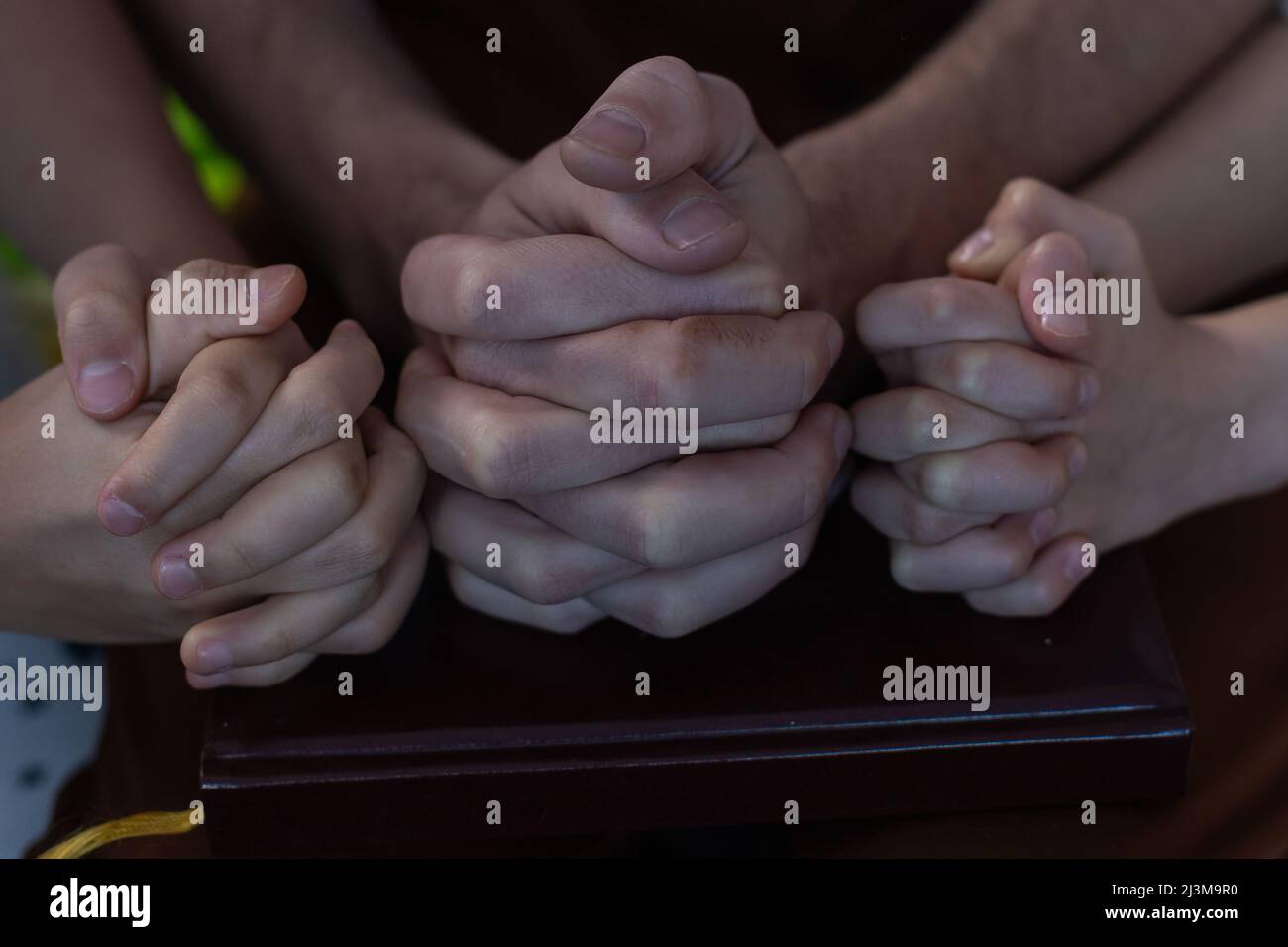 children praying with parent at home, family pray together, online ...