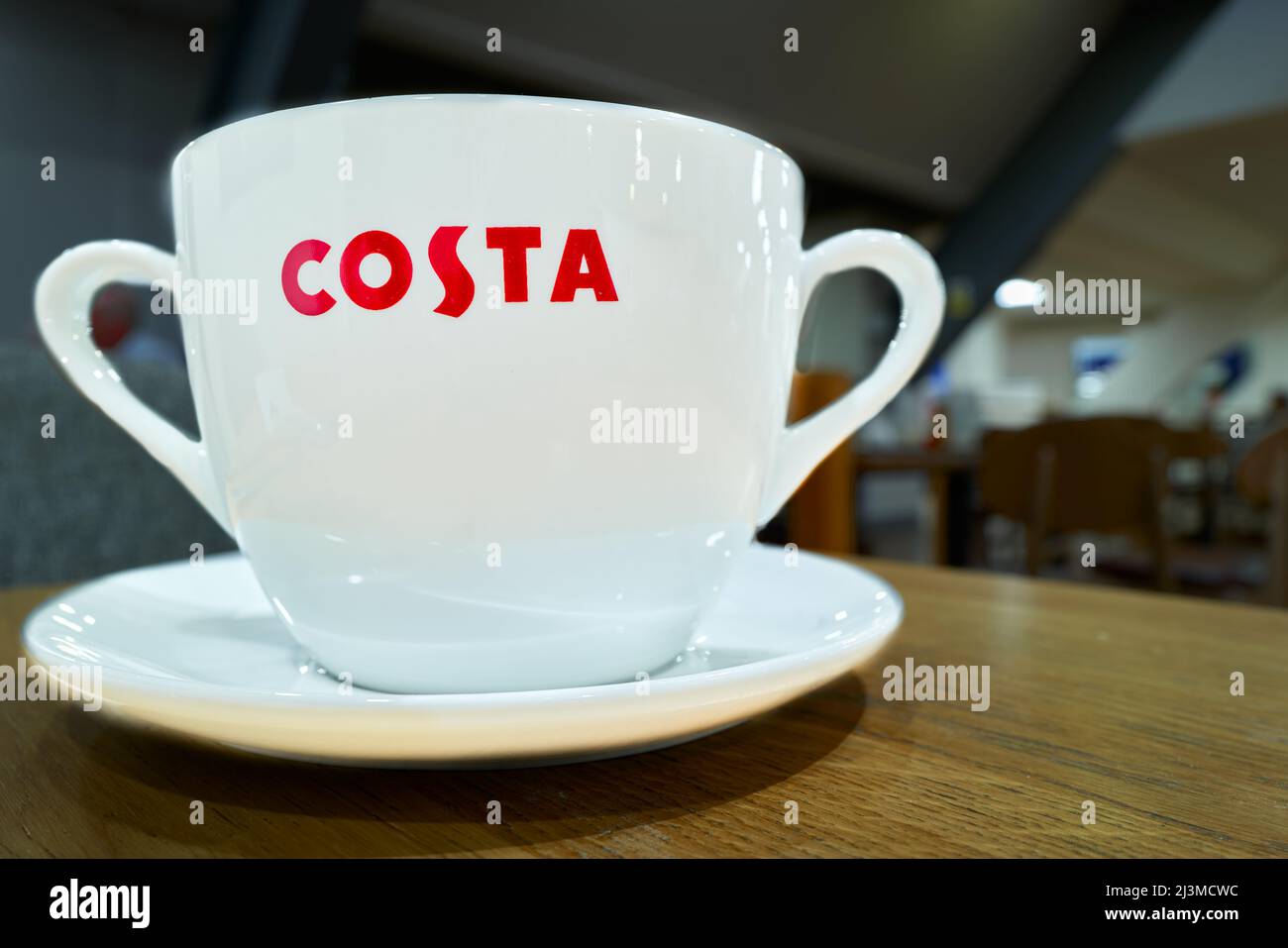 Cup of Costa coffee on a table during a coffee break at a service ...
