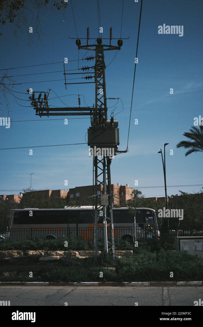 bus and electric poll Stock Photo - Alamy