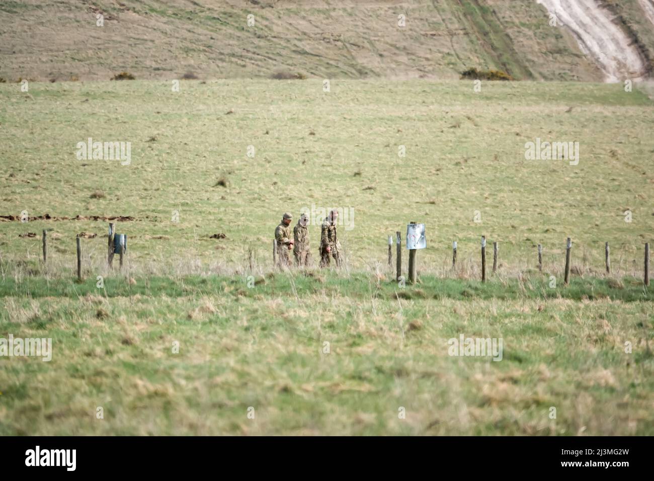 British army soldiers preparing in-ground explosives for a mock battle ...