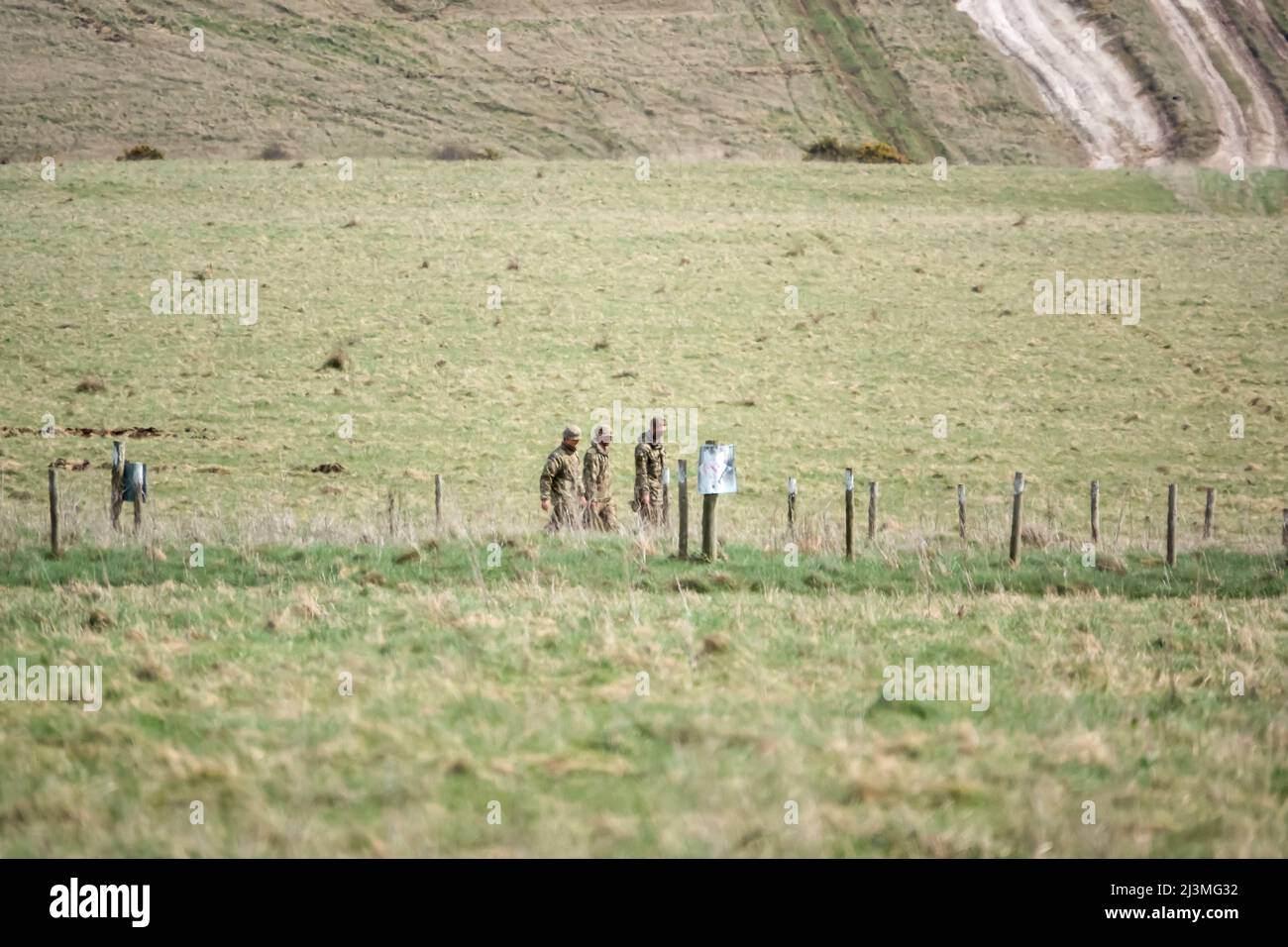 British army soldiers preparing in-ground explosives for a mock battle ...