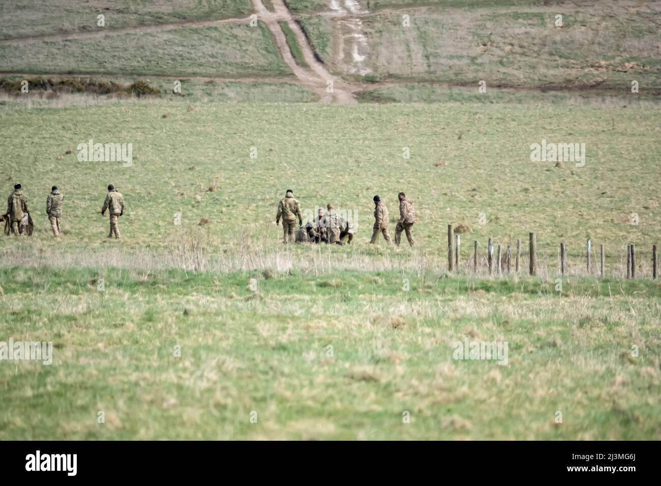 British army soldiers preparing in-ground explosives for a mock battle ...