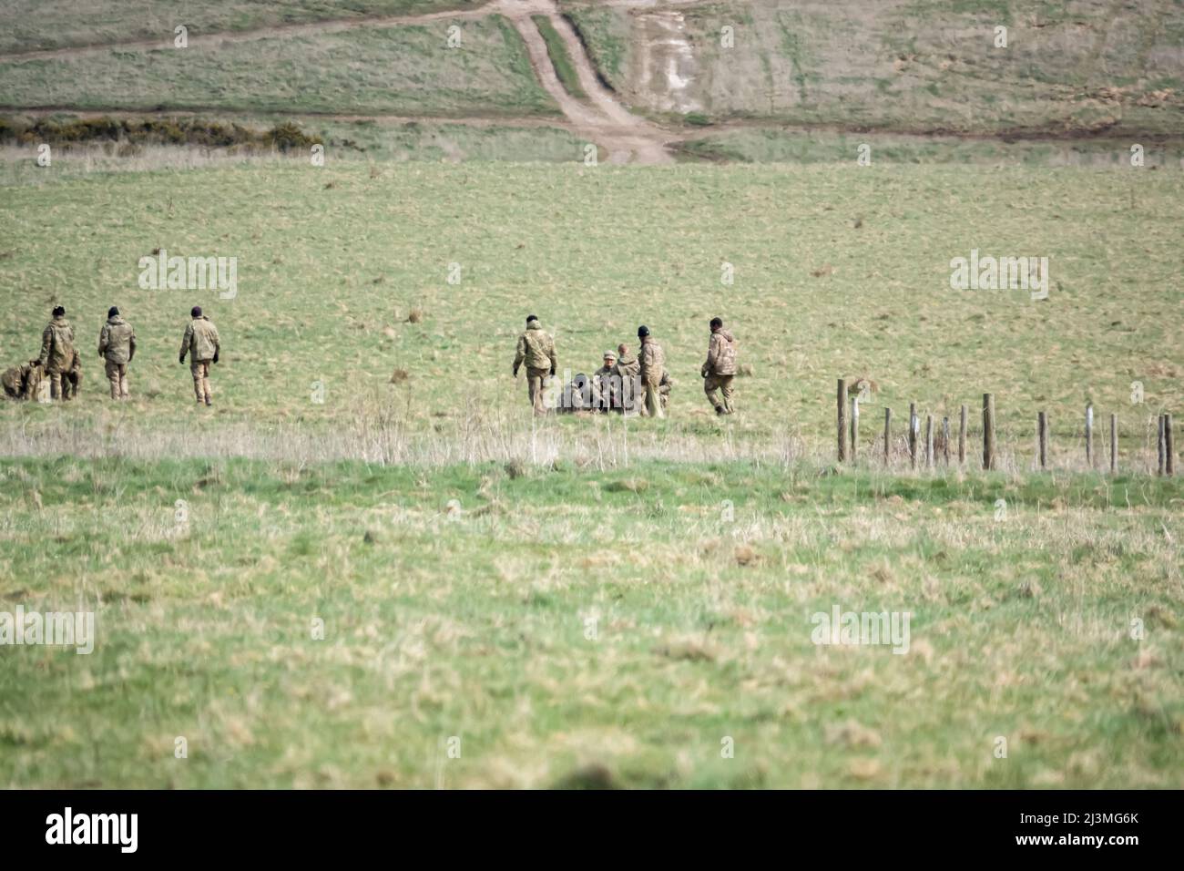British army soldiers preparing in-ground explosives for a mock battle ...