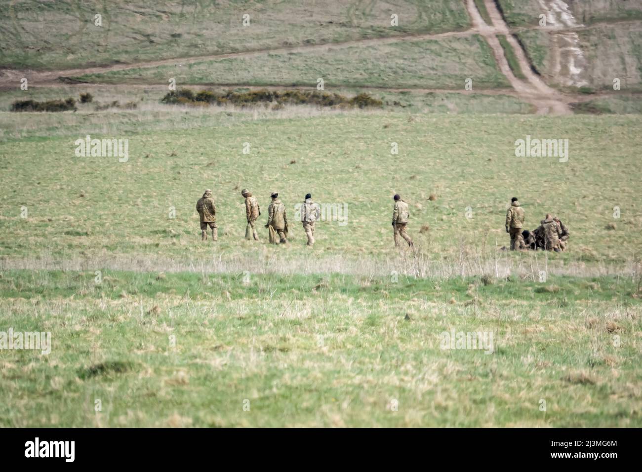 British army soldiers preparing in-ground explosives for a mock battle ...