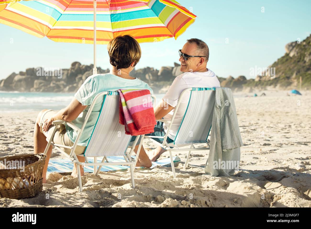 Leave your worries behind and head for the beach. Shot of a couple ...