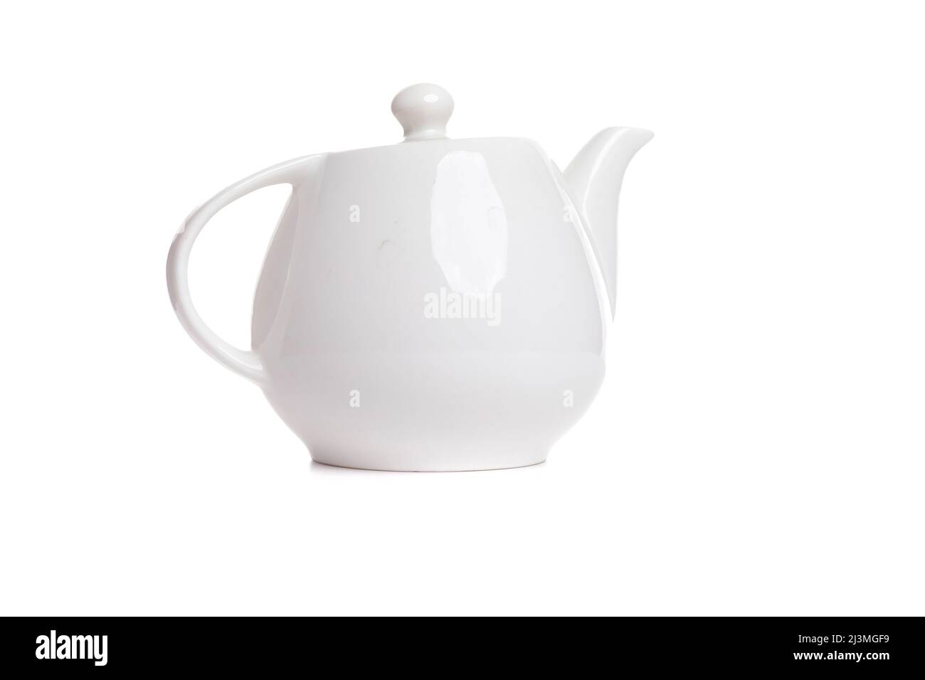 white ceramic teapot with handle on white isolated background Stock ...