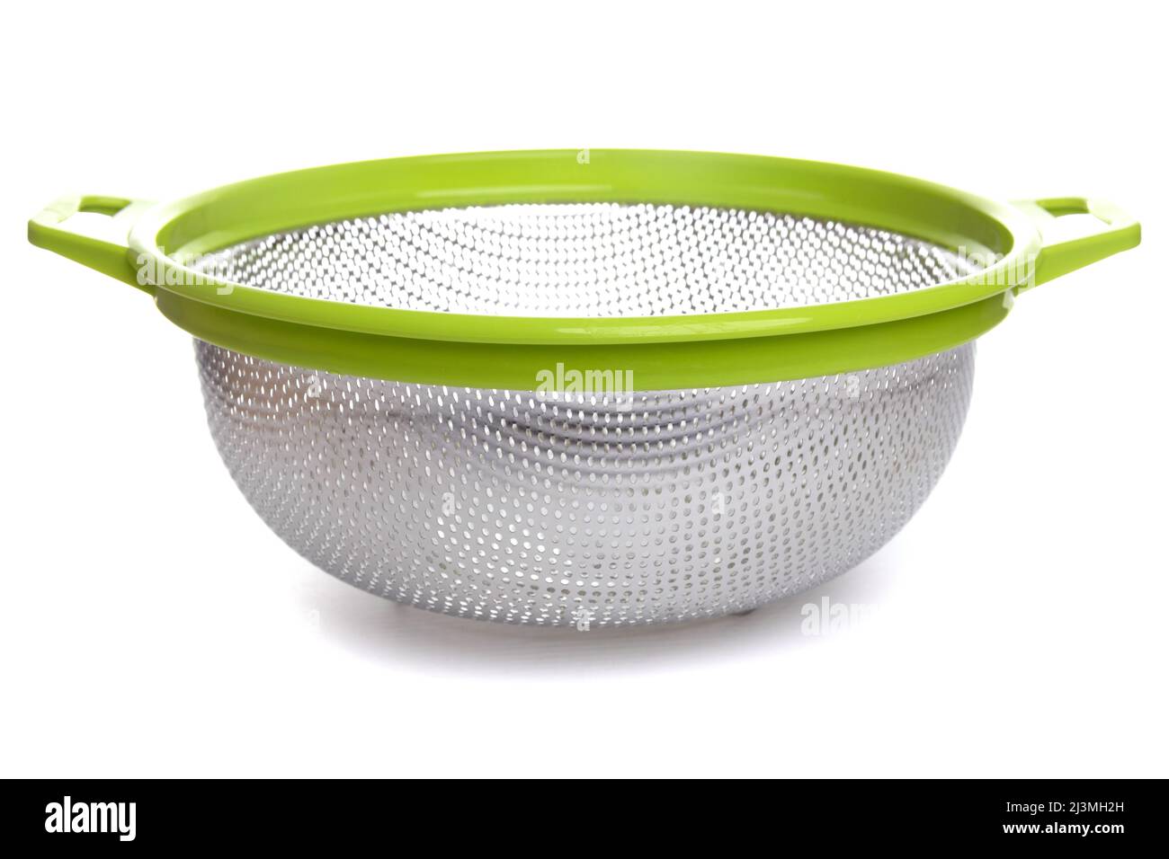 aluminum colander with plastic light green handles on a white isolated ...