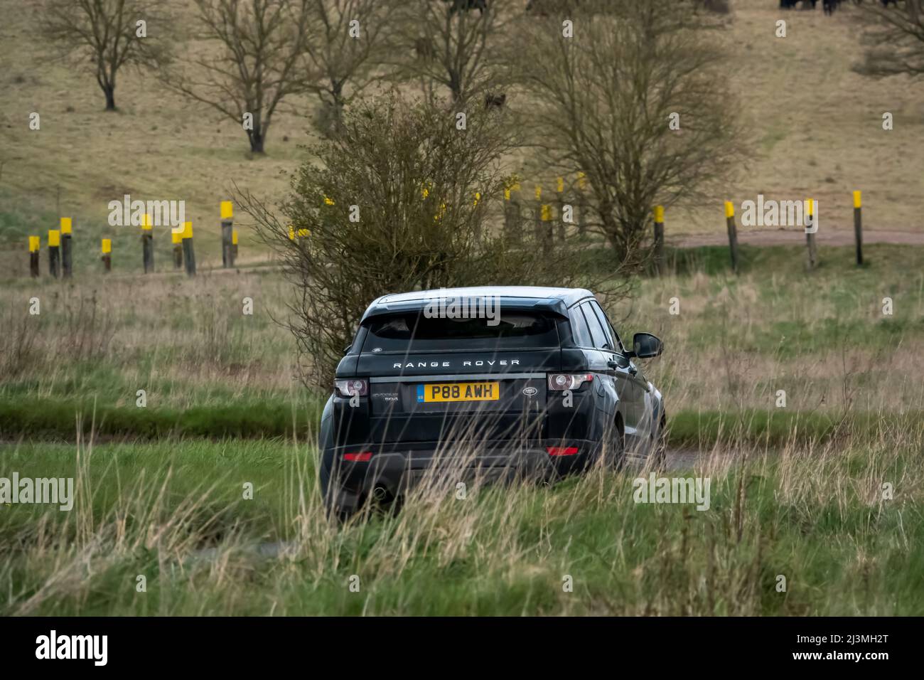 black off road range rover eqvoque 4x4 vehicle in english countryside ...
