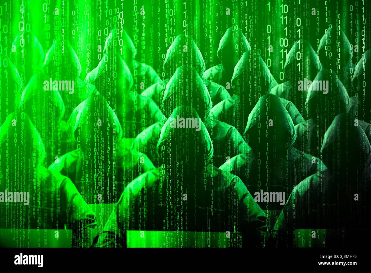 Anonymous hooded hackers, green background, binary code - cyber attack concept Stock Photo - Alamy