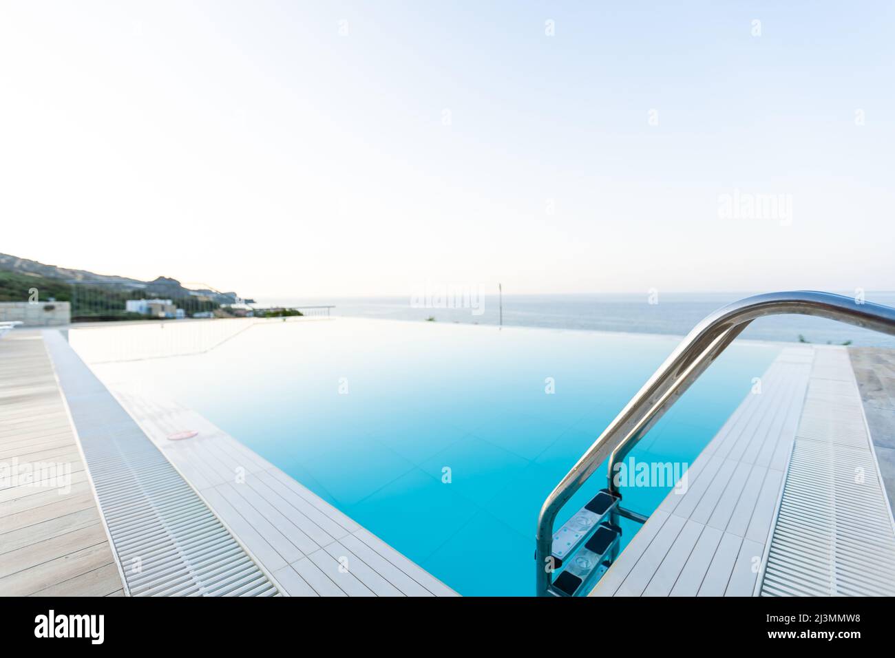 Swimming pool on top of roof deck building Stock Photo - Alamy