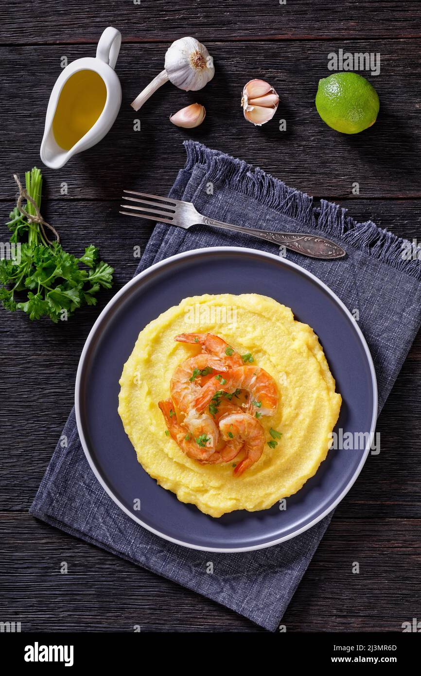 Polenta e schie fritte, venetian dish, polenta with fried shrimps on a ...