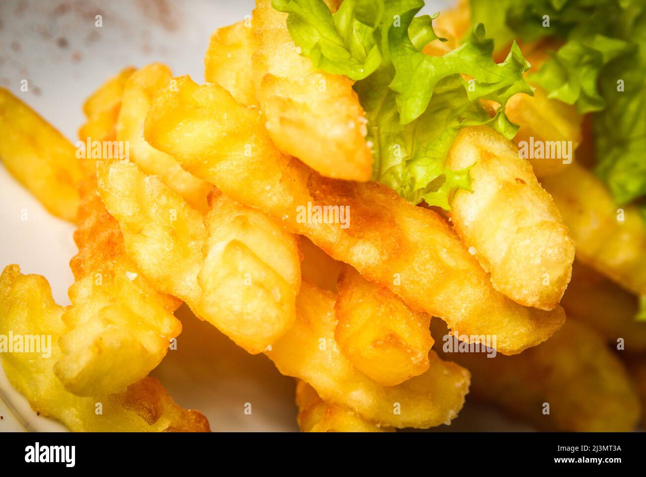 Wavy fries hi-res stock photography and images - Alamy
