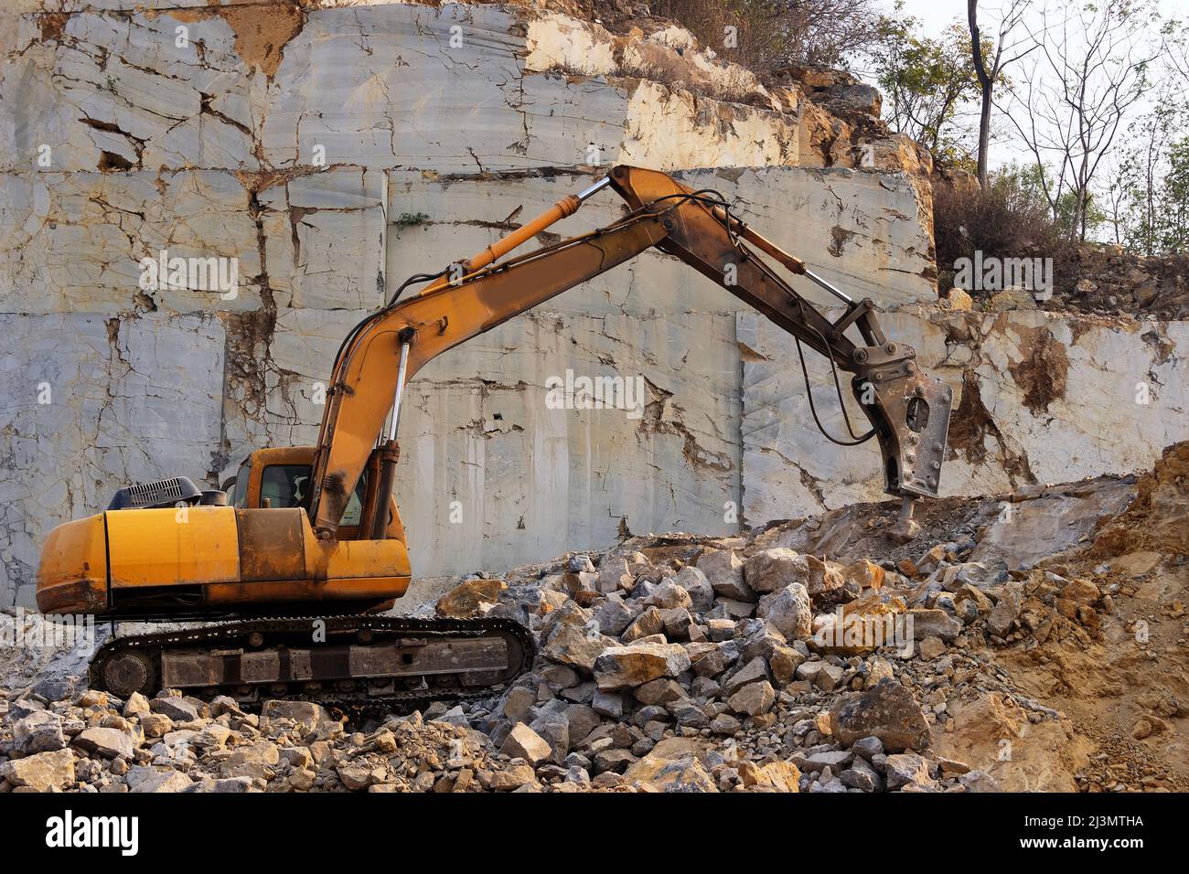 Breaker used to break up boulders in open cast mine. Mining in southern ...