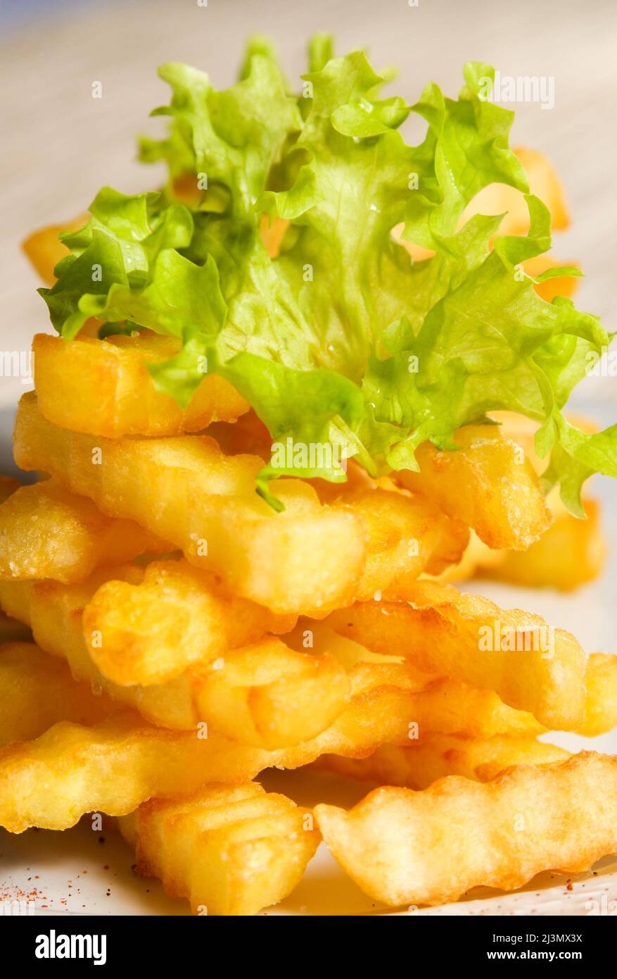 Fresh fried french fries Stock Photo - Alamy