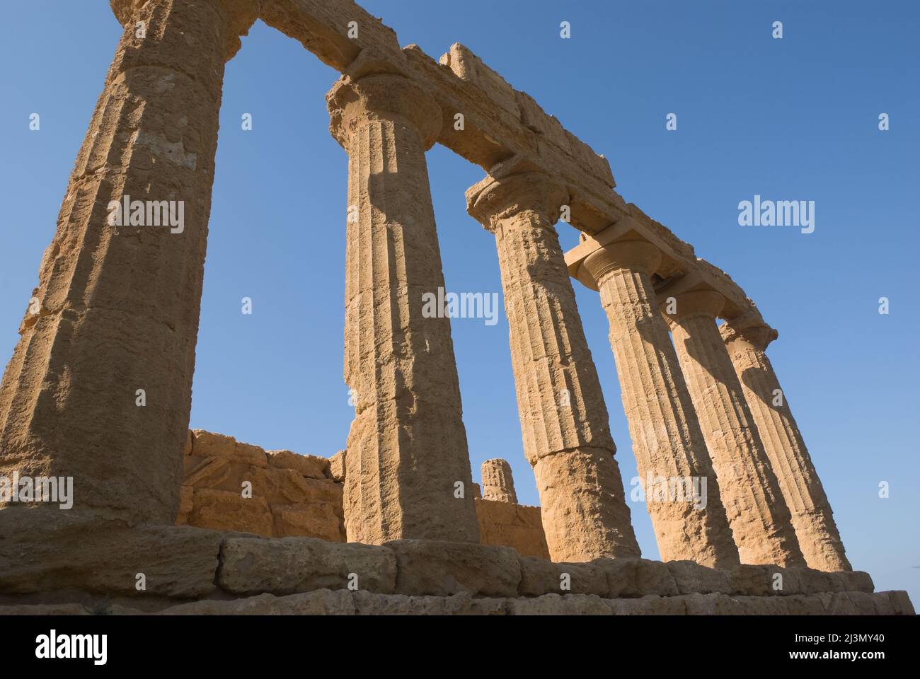 below view of column in Valley Of Temples in Agrigento against clear ...