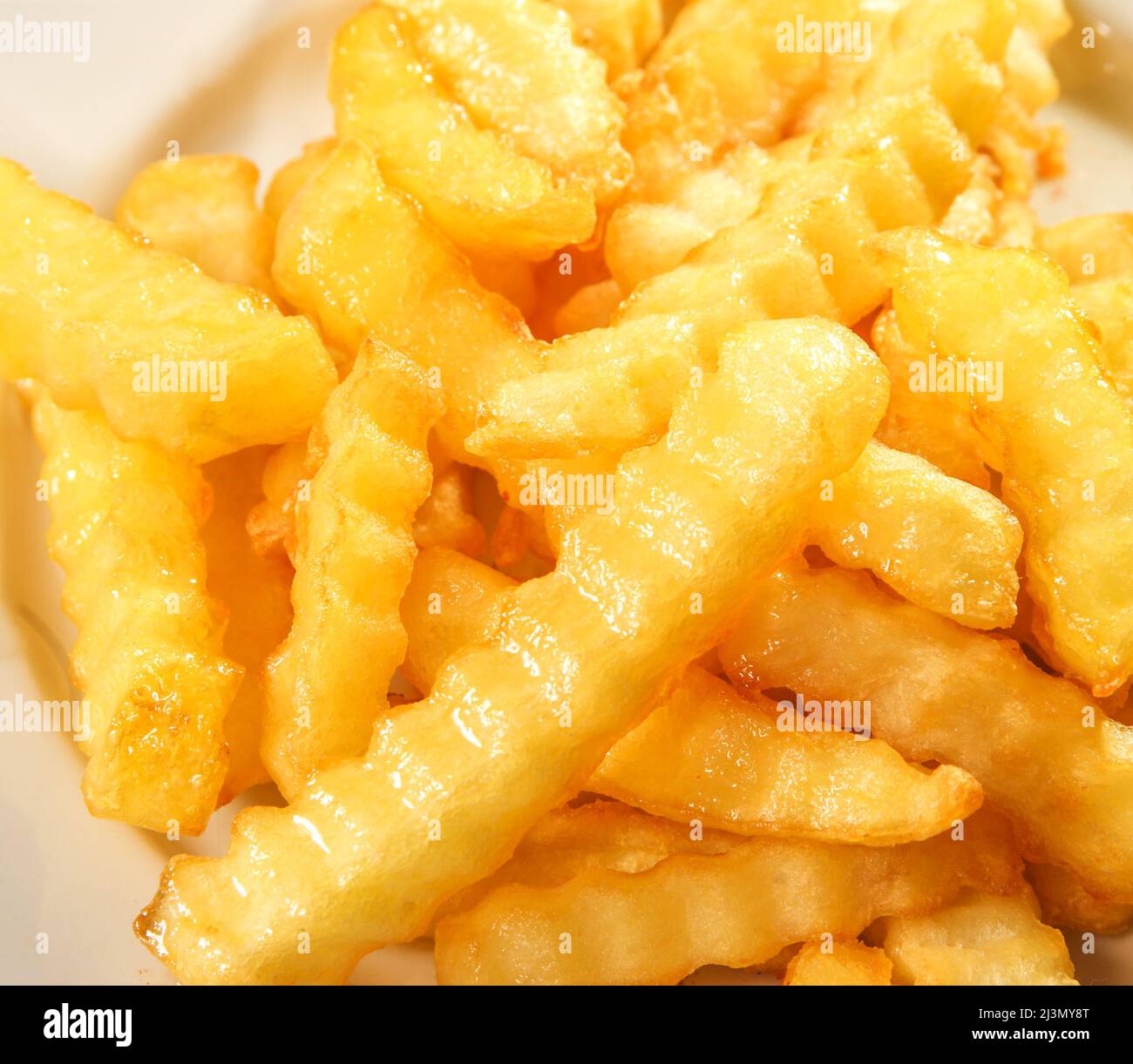 Fresh fried french fries Stock Photo - Alamy