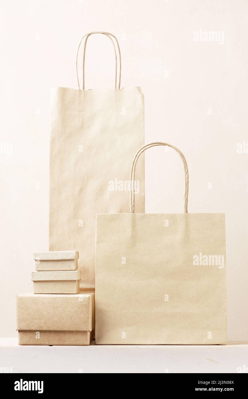 Disposable recycling packages, paper bags and boxes on the table Stock ...