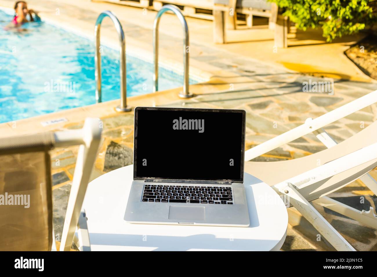 computer on table background as a pool Stock Photo - Alamy