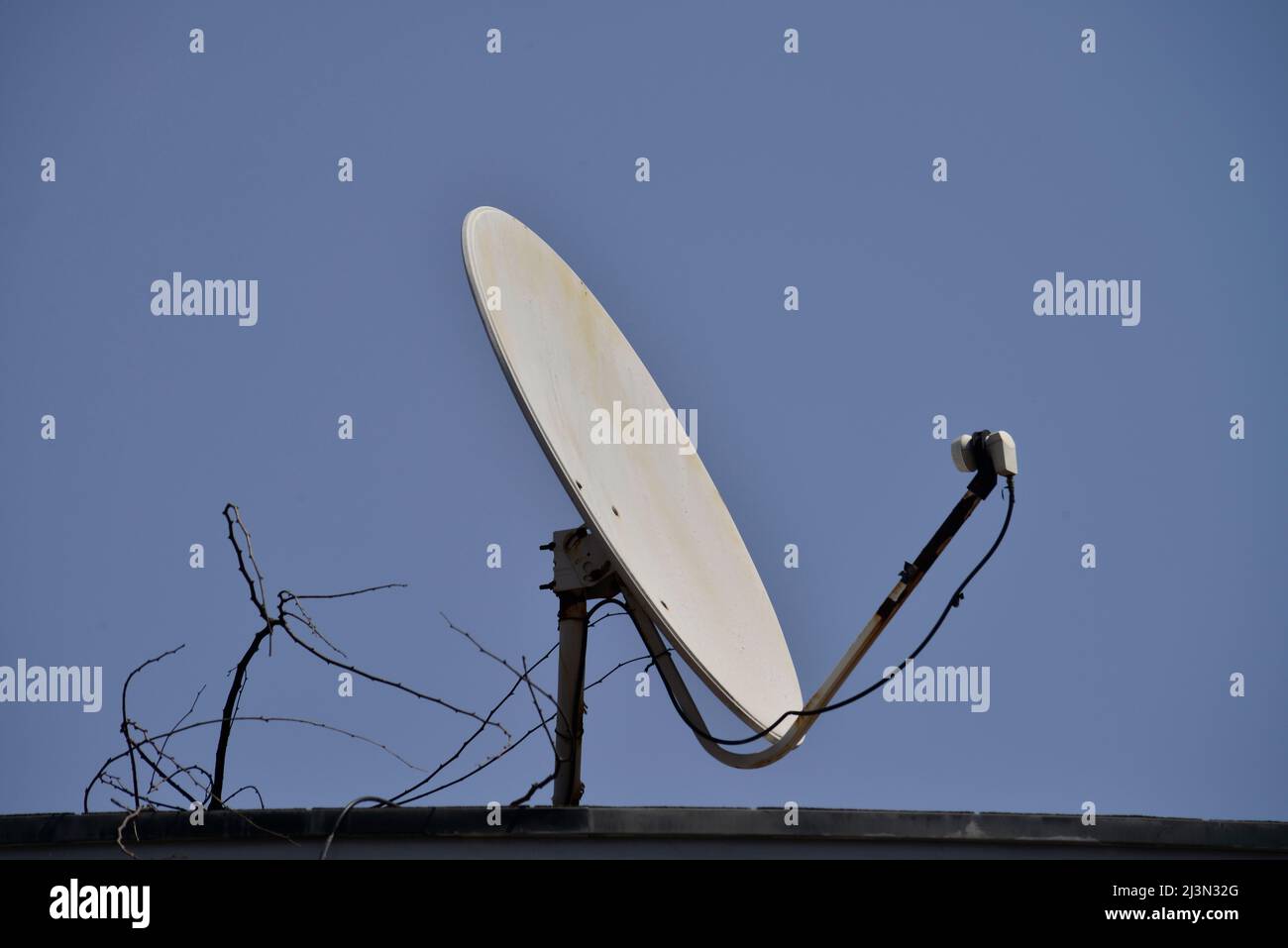 This is an old TV satellite dish on top of old apartment in Seoul Korea ...