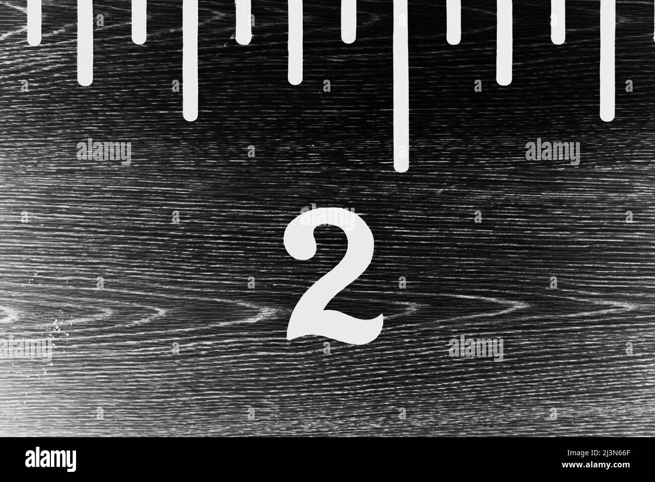 Closeup of the number two a traditional wooden school ruler used to ...