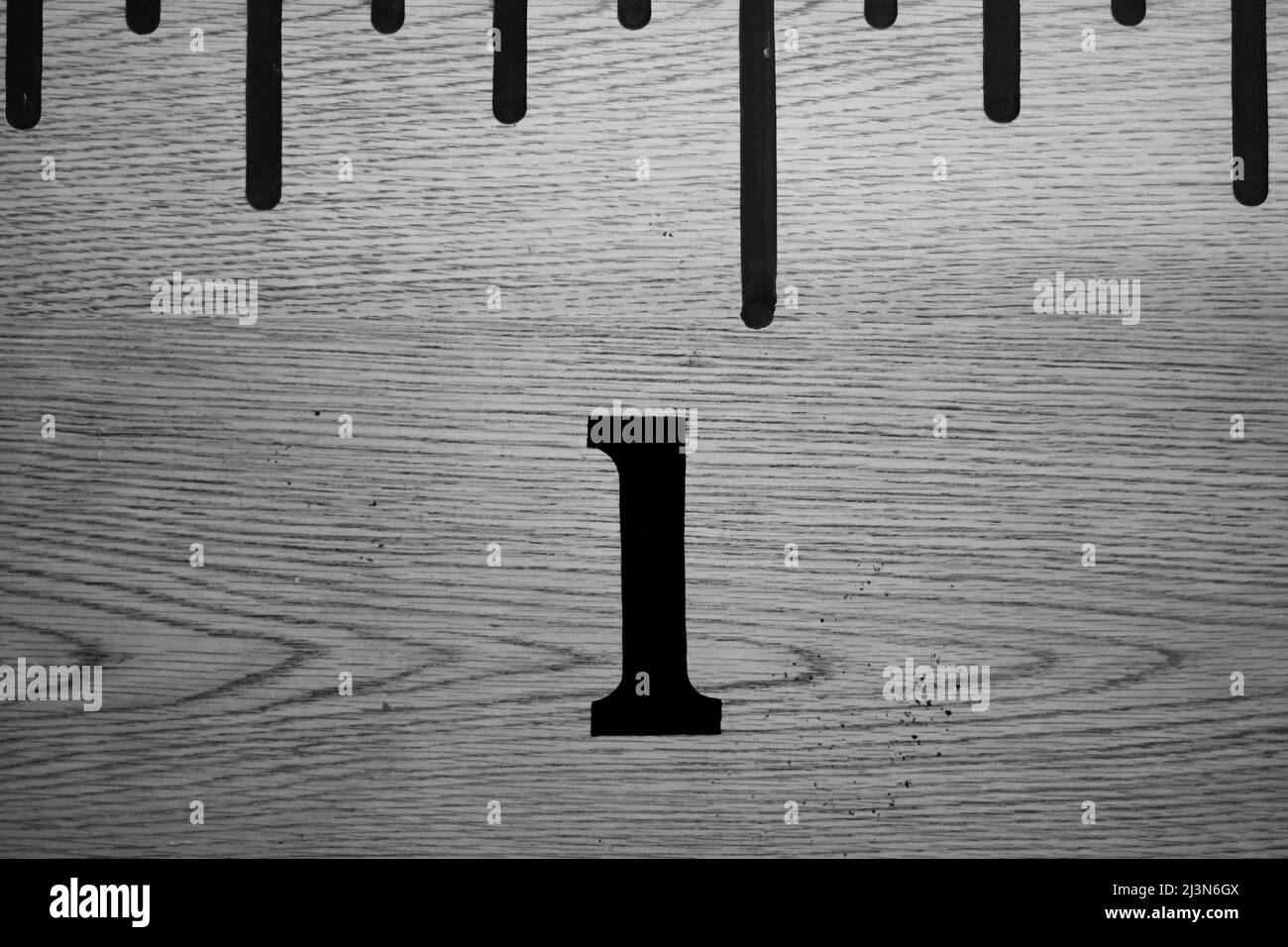 Closeup of the number one on a traditional wooden school ruler used to ...