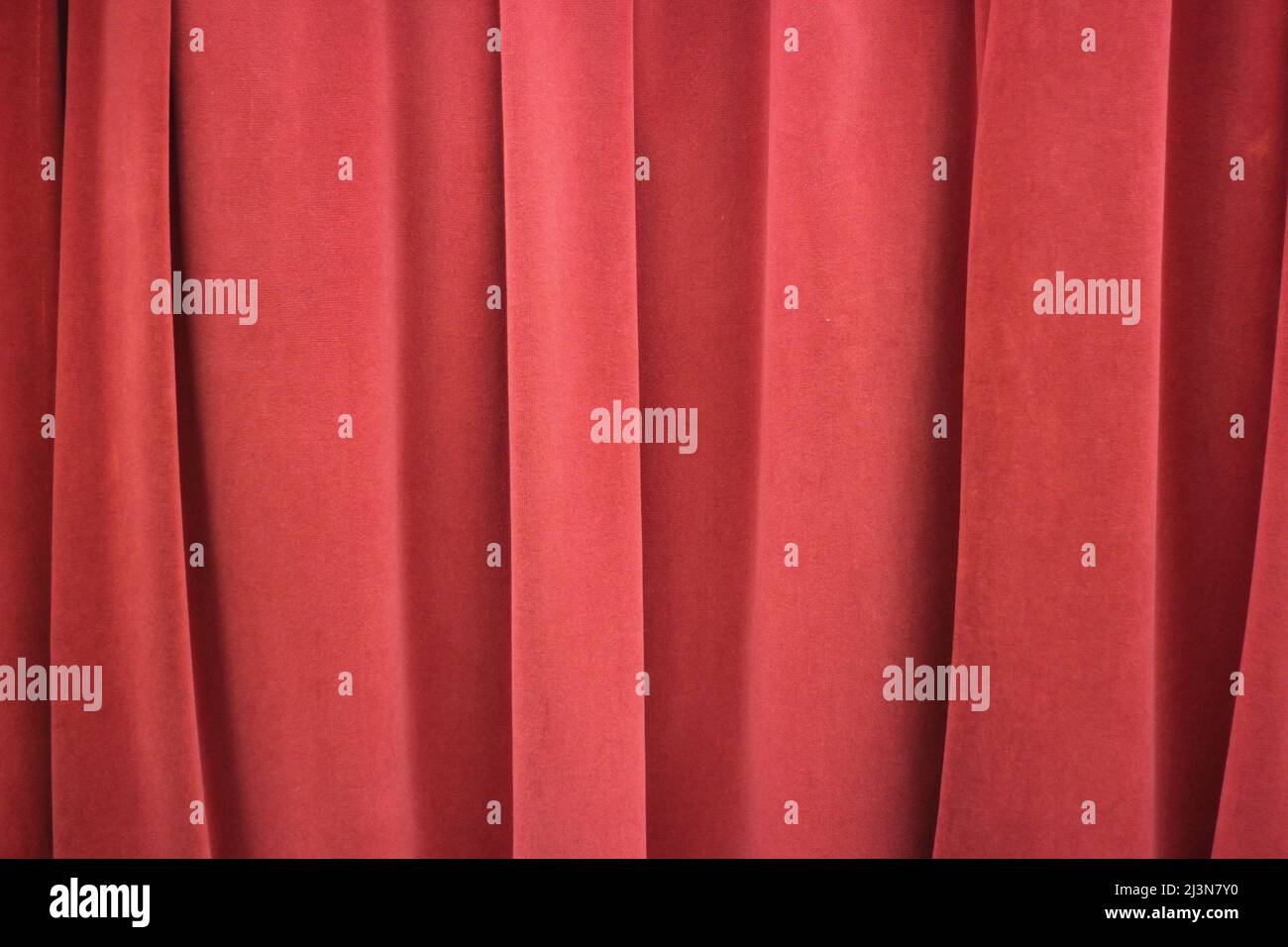Formal stage theater curtains hanging from above Stock Photo - Alamy