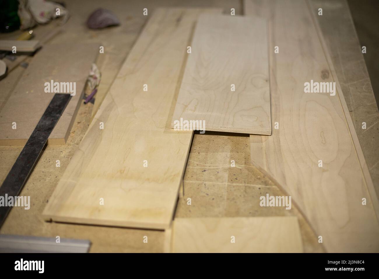 Boards on table. Joinery. Details of woodworking. Manufacture of ...