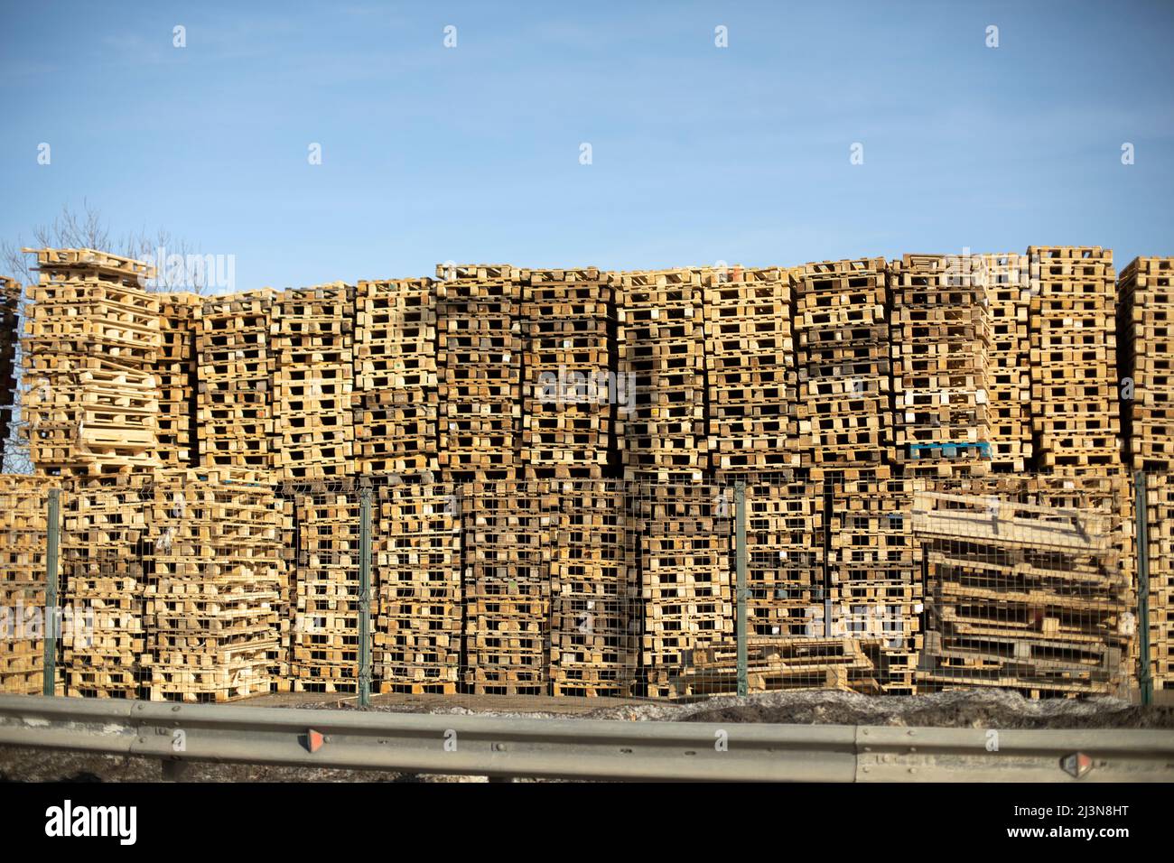 Lots of pallets. Warehouse of wooden pallets. Boarding. Lots of stacks ...