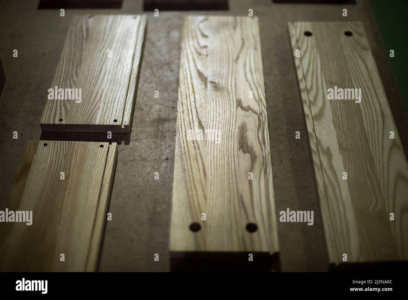 Board in workshop. Unpainted wood. Natural material. Details of ...