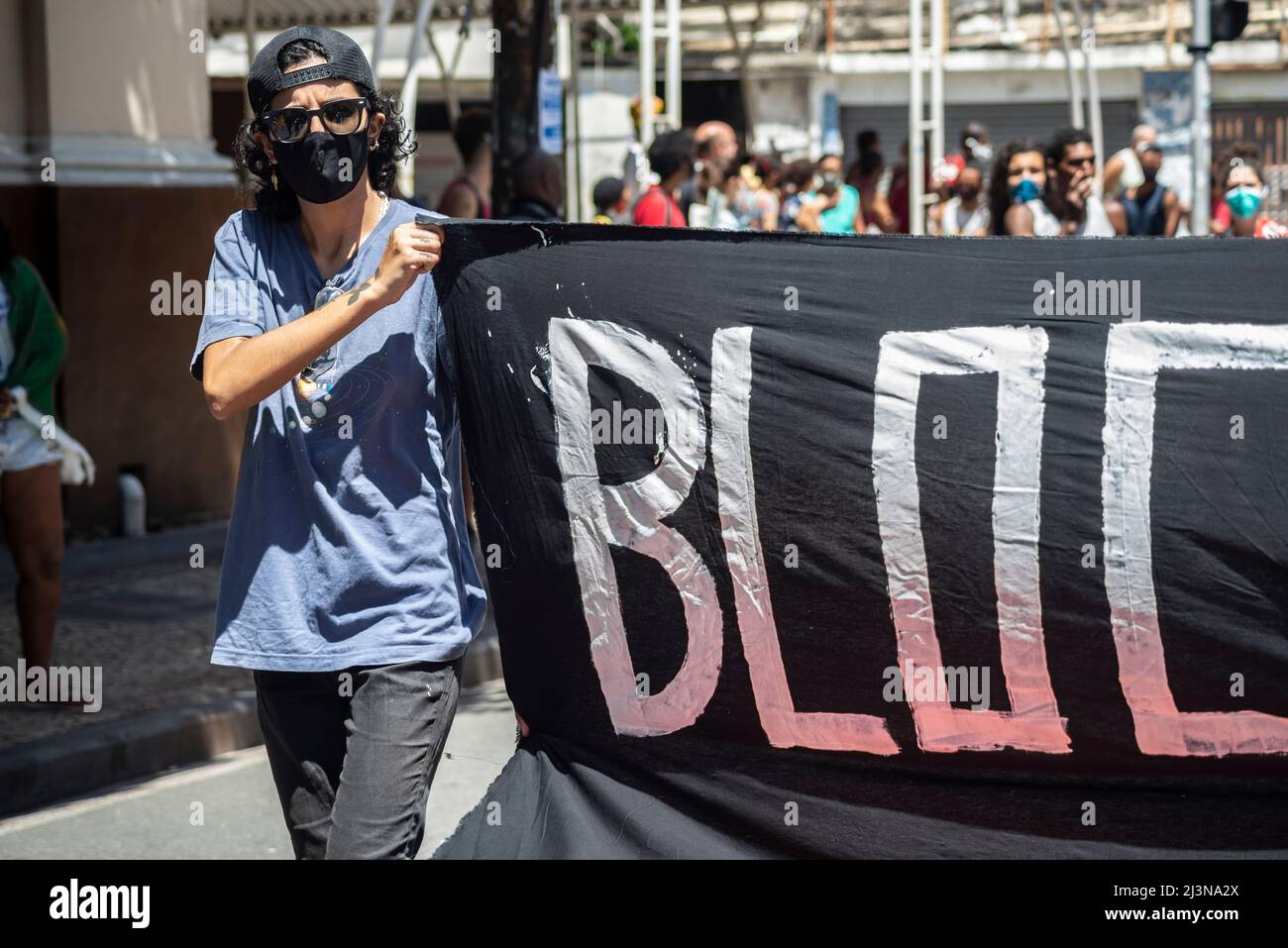 Brazilians protest with banners and posters against the government of ...