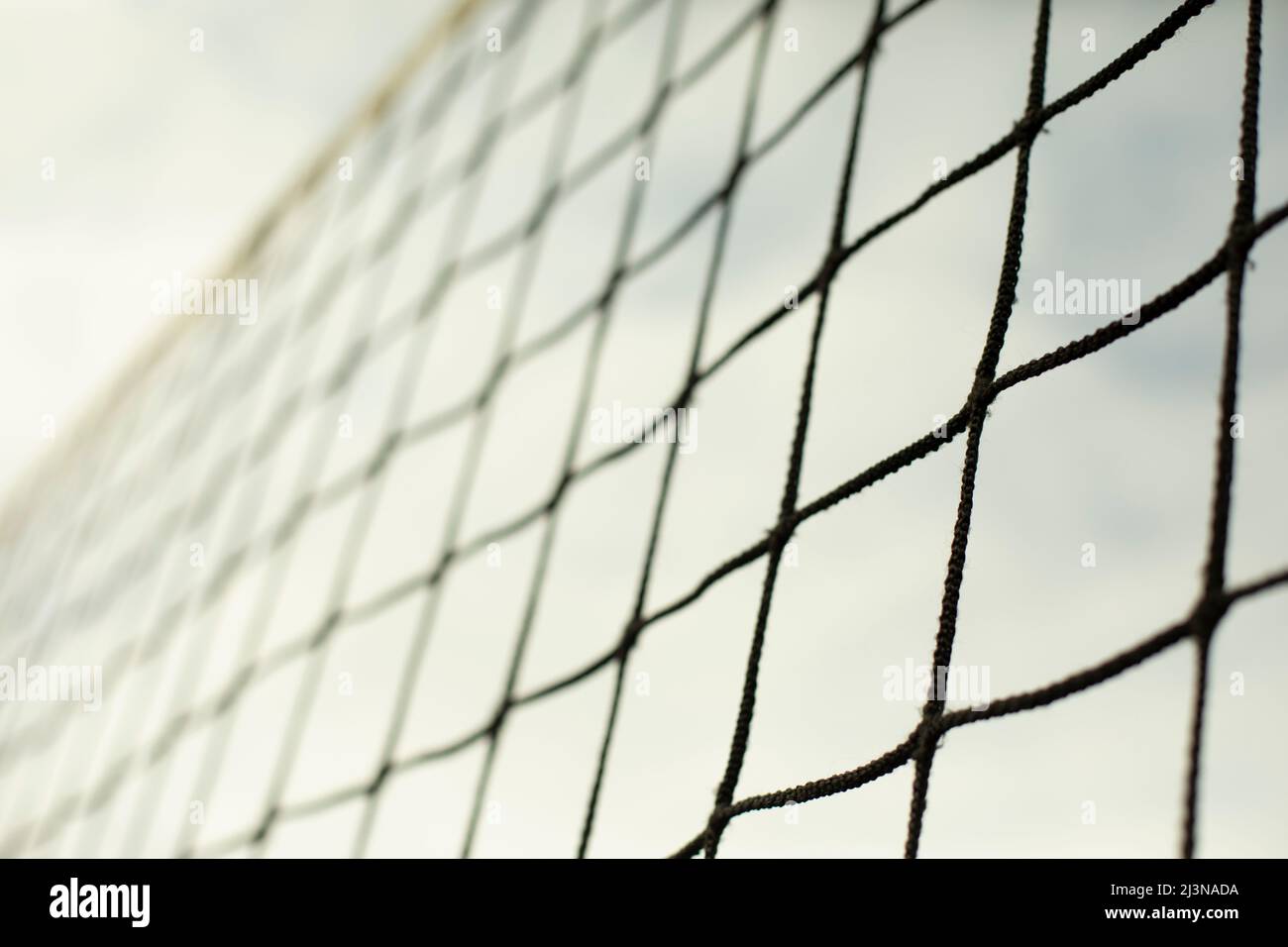 Sports net. Volleyball equipment. Grid against sky. Background cell of ...