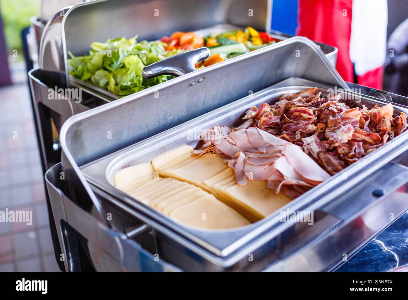 Slices of emmental cheese and italian baked ham Stock Photo - Alamy