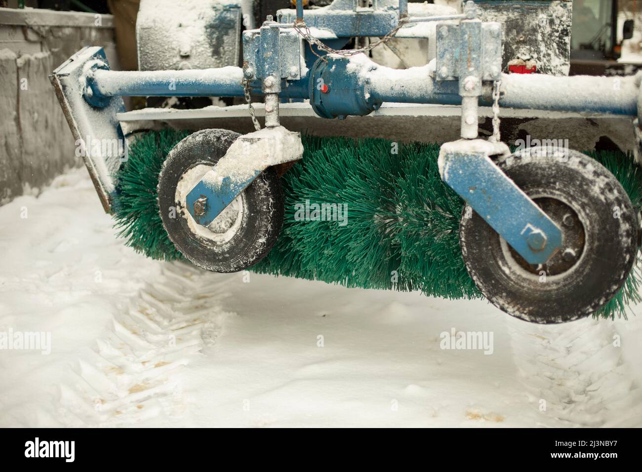 Equipment for snow removal. Large brush for cleaning road. Tractor for ...