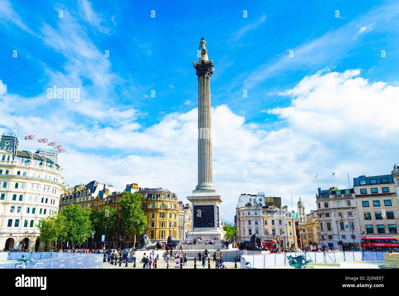 View of Trafalgar Square with Nelson`s Column rises above this iconic ...