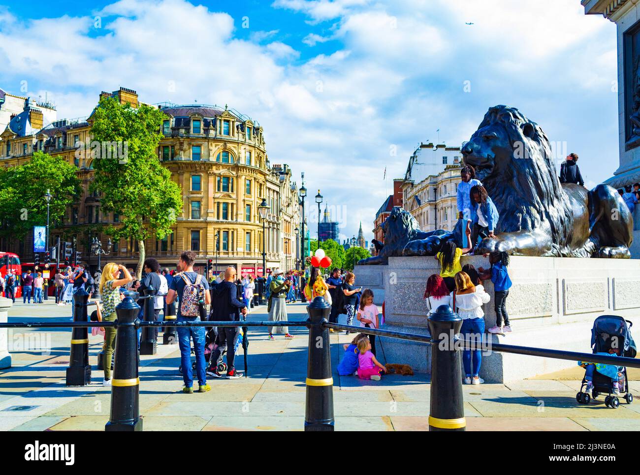 View of Trafalgar Square with Nelson`s Column rises above this iconic ...