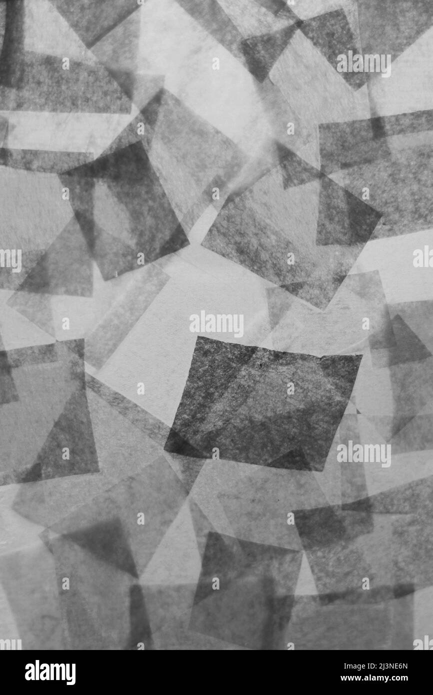 Craft tissue paper glued to a window as an abstract translucent ...