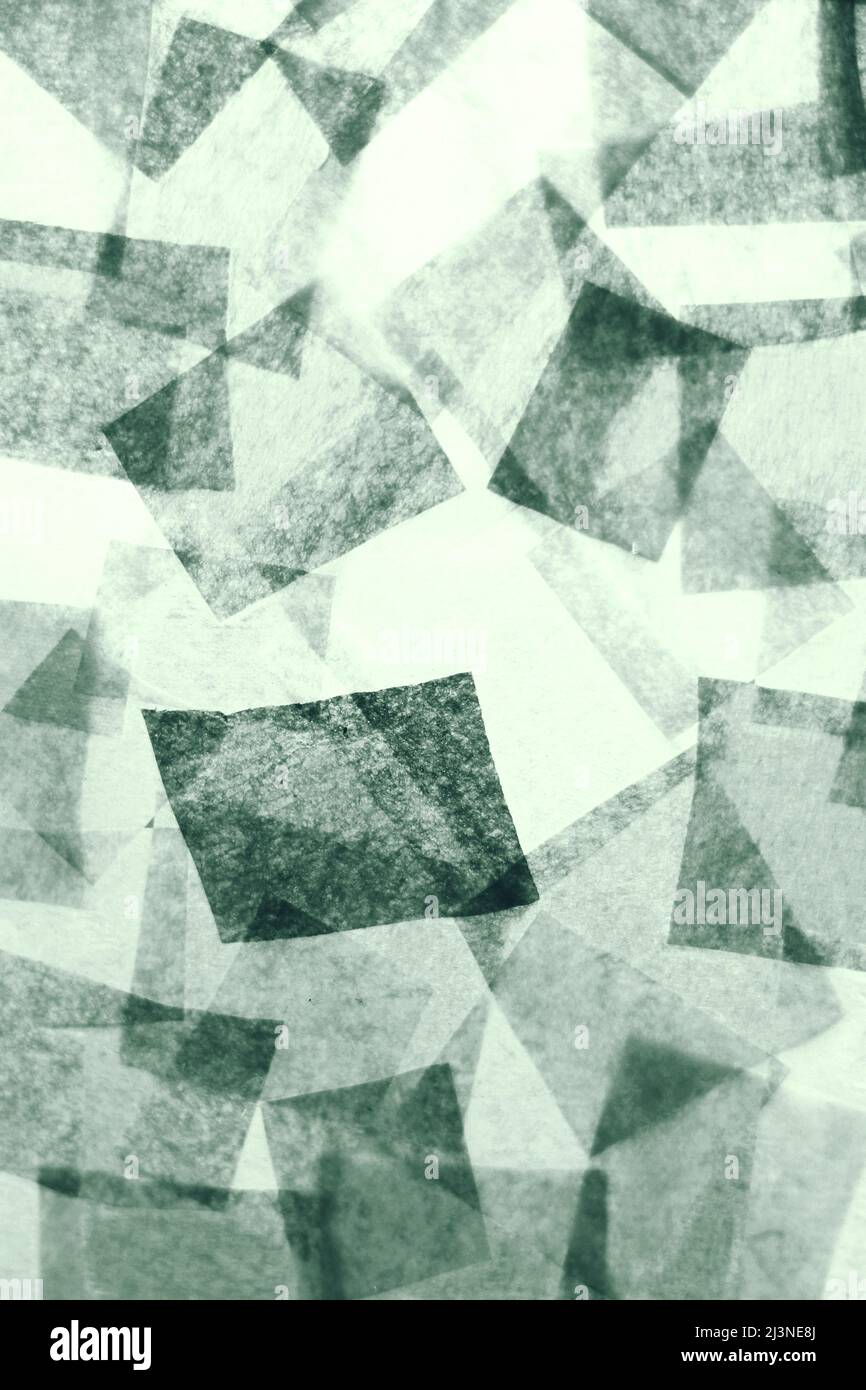 Craft tissue paper glued to a window as an abstract translucent ...