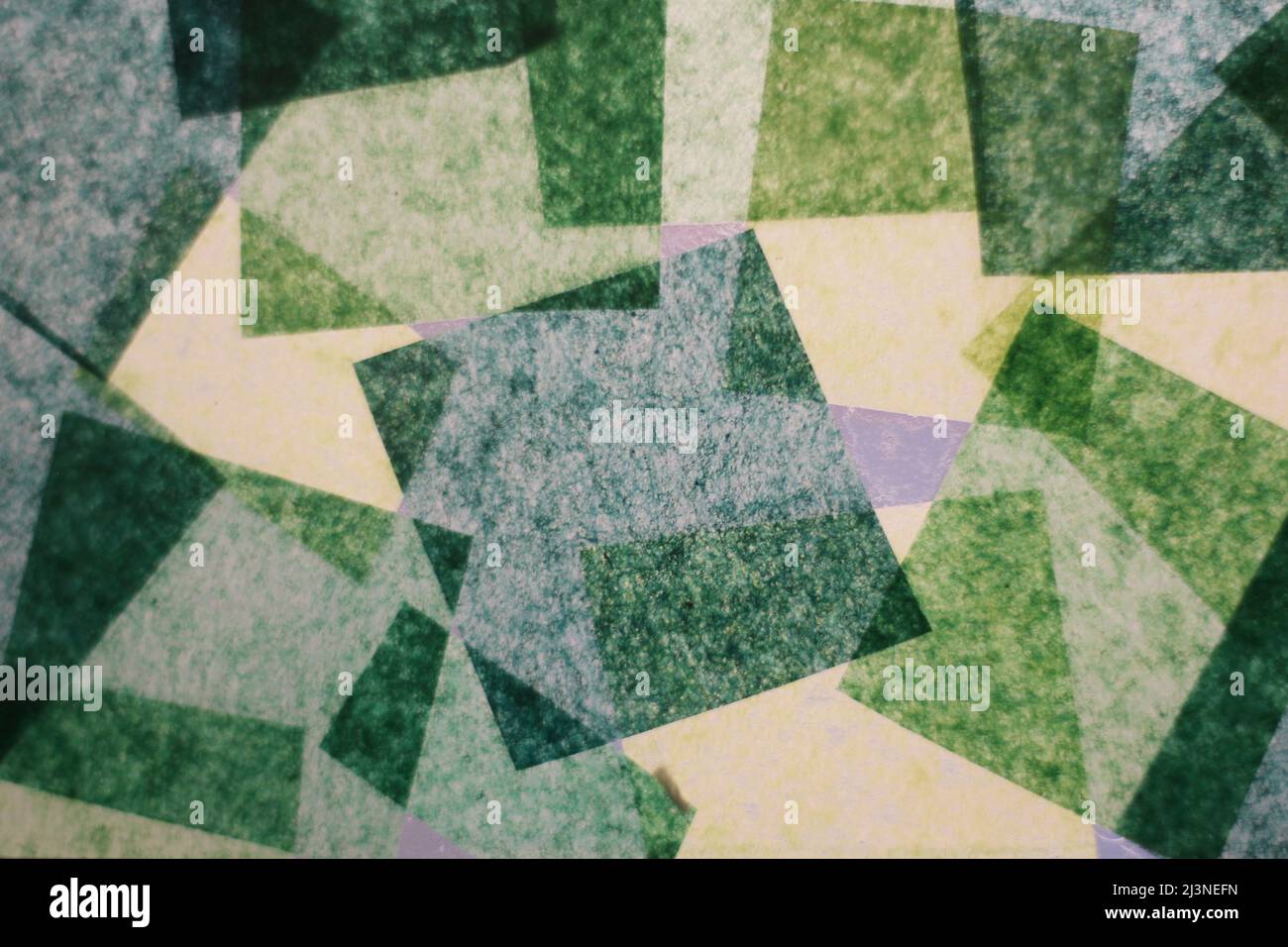 Craft tissue paper glued to a window as an abstract translucent ...