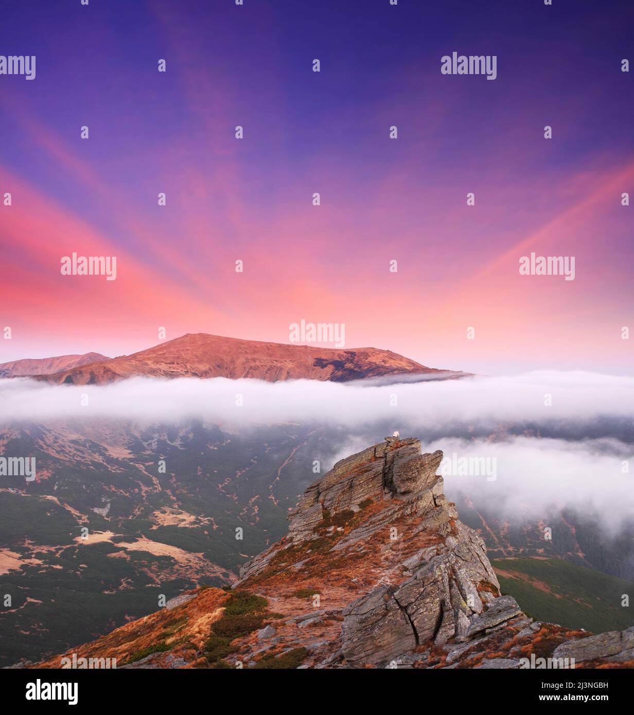 Landscape with mountains under morning sky with clouds Stock Photo - Alamy