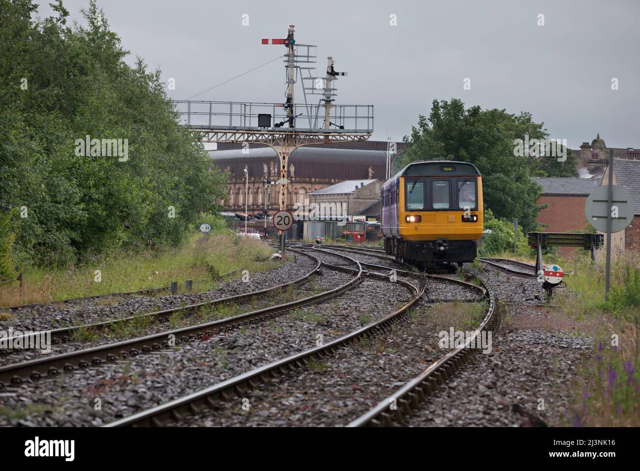 Northern Rail class 142 pacer train 142040 passing semaphore signals ...