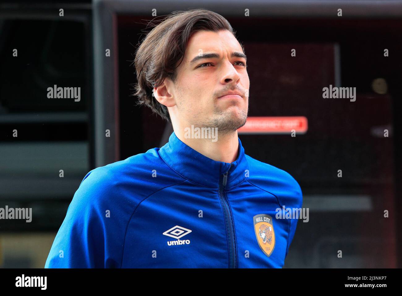 Jacob Greaves #4 of Hull City gets off the team bus on arrival at The ...