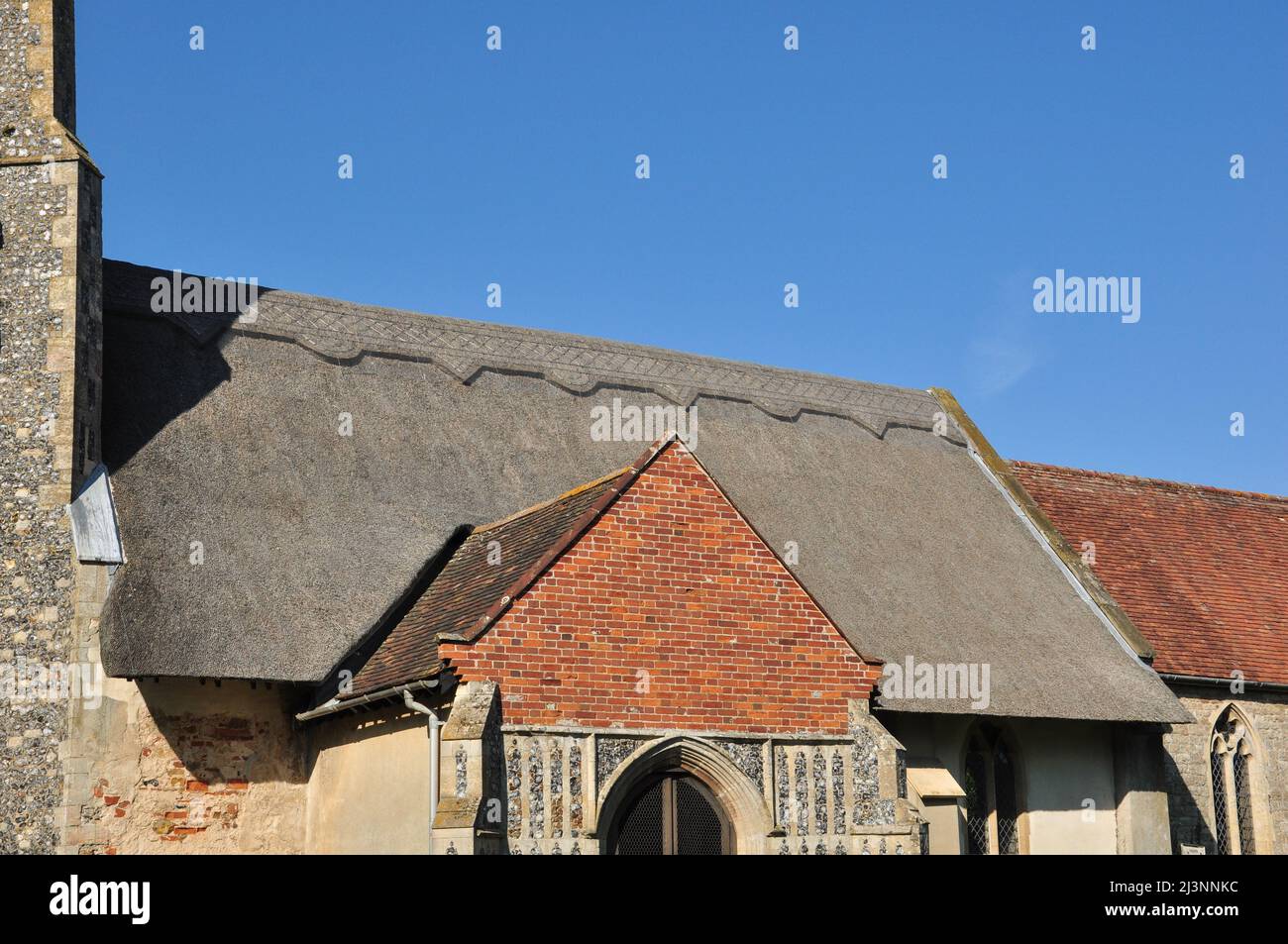 The thatched roof of St Botolph's Church at Iken situated near the ...