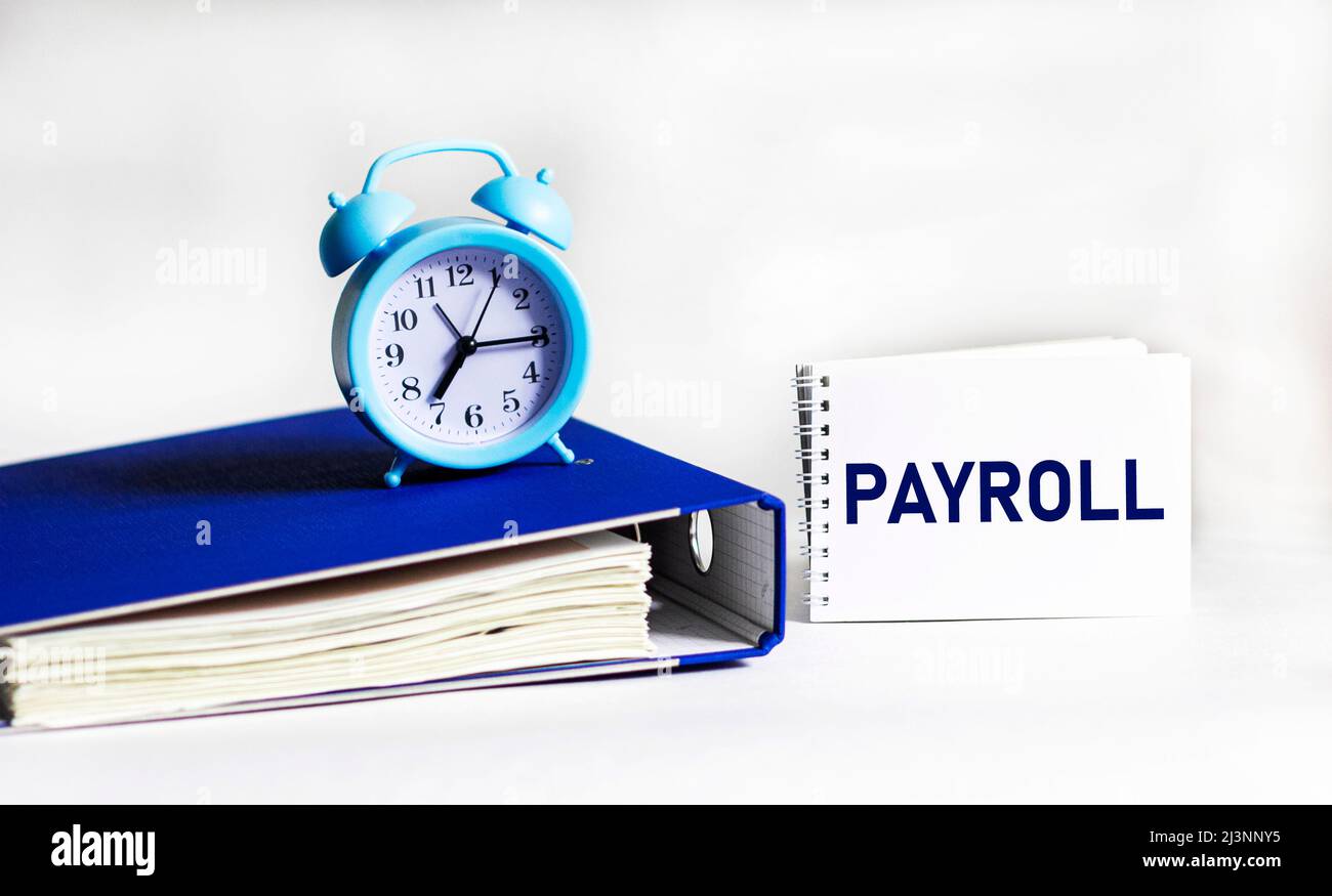 Word PAYROLL on notepad and white background, HR concept Stock Photo ...