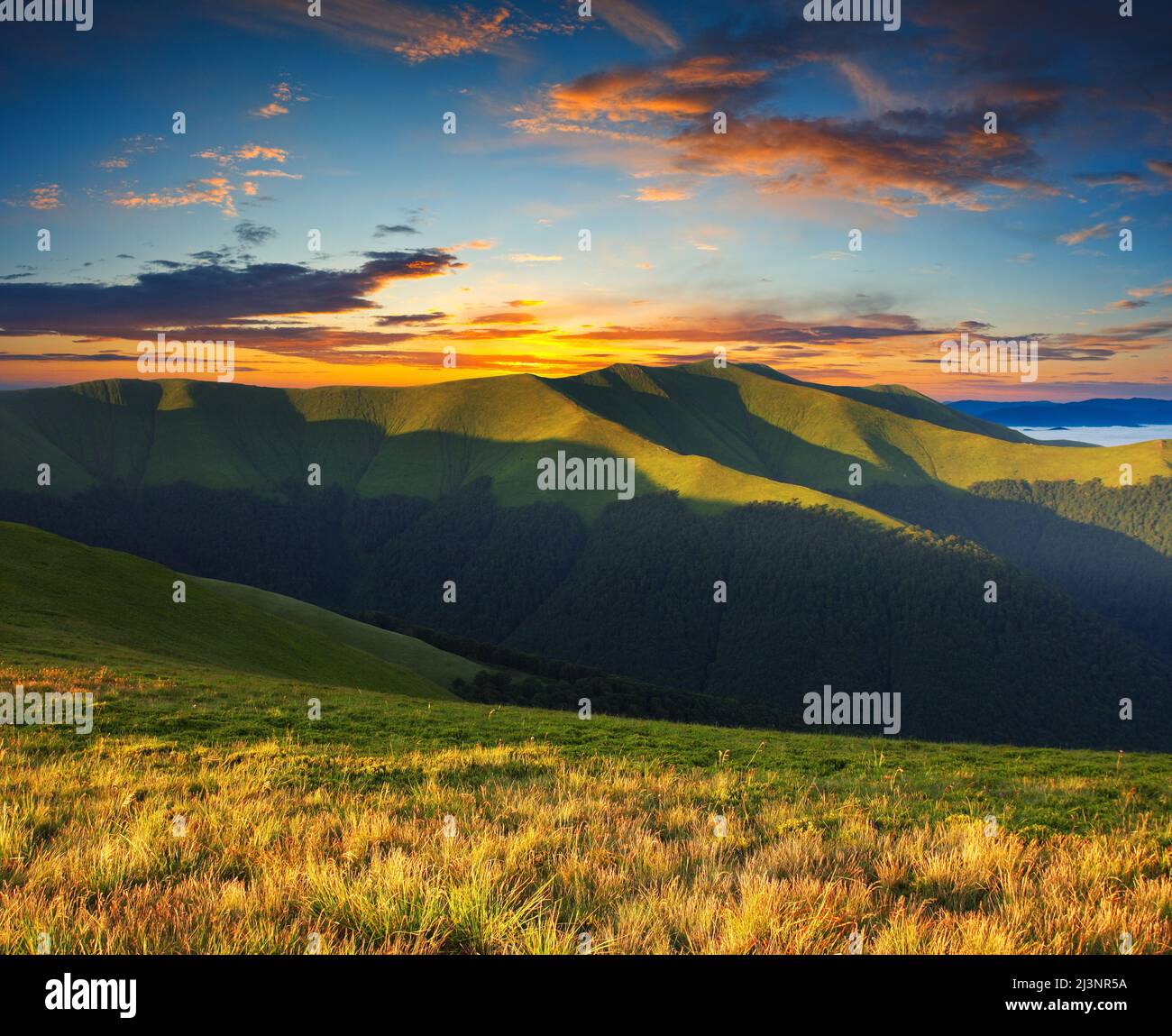 Landscape with mountains under morning sky with clouds Stock Photo - Alamy