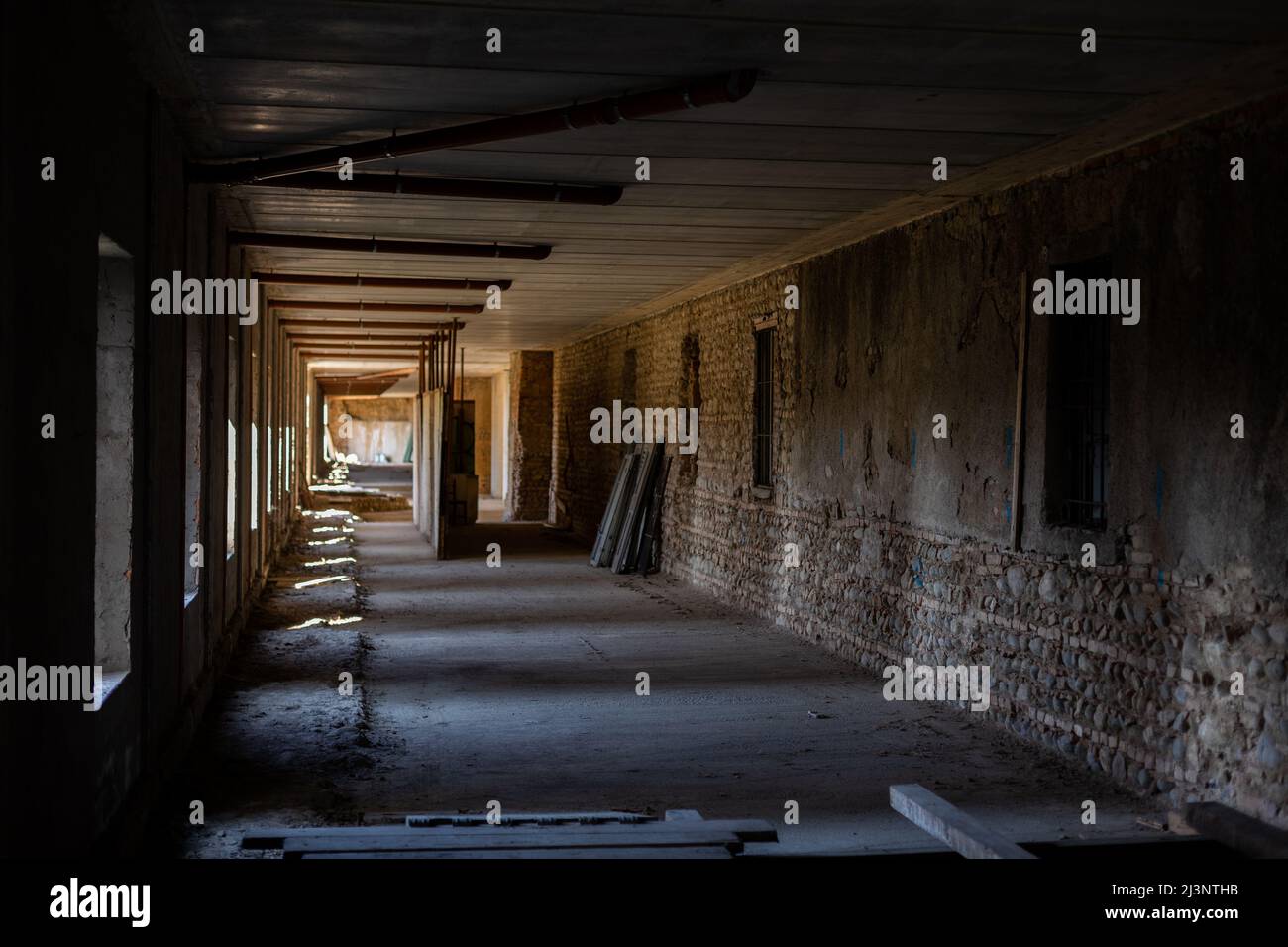 a long corridor with arches in an old house in europe Stock Photo - Alamy